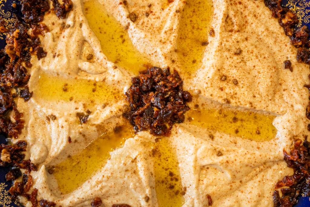 Hummus with Sun-Dried Tomatoes in Oil and Roasted Pumpkin Seeds ...